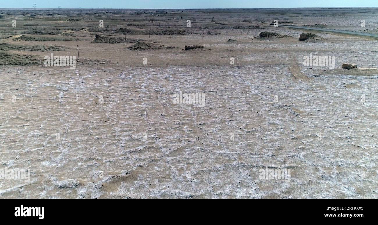 GOLMUD, CHINA - JULY 21, 2023 - The salt crust of the Qaidam Basin is ...