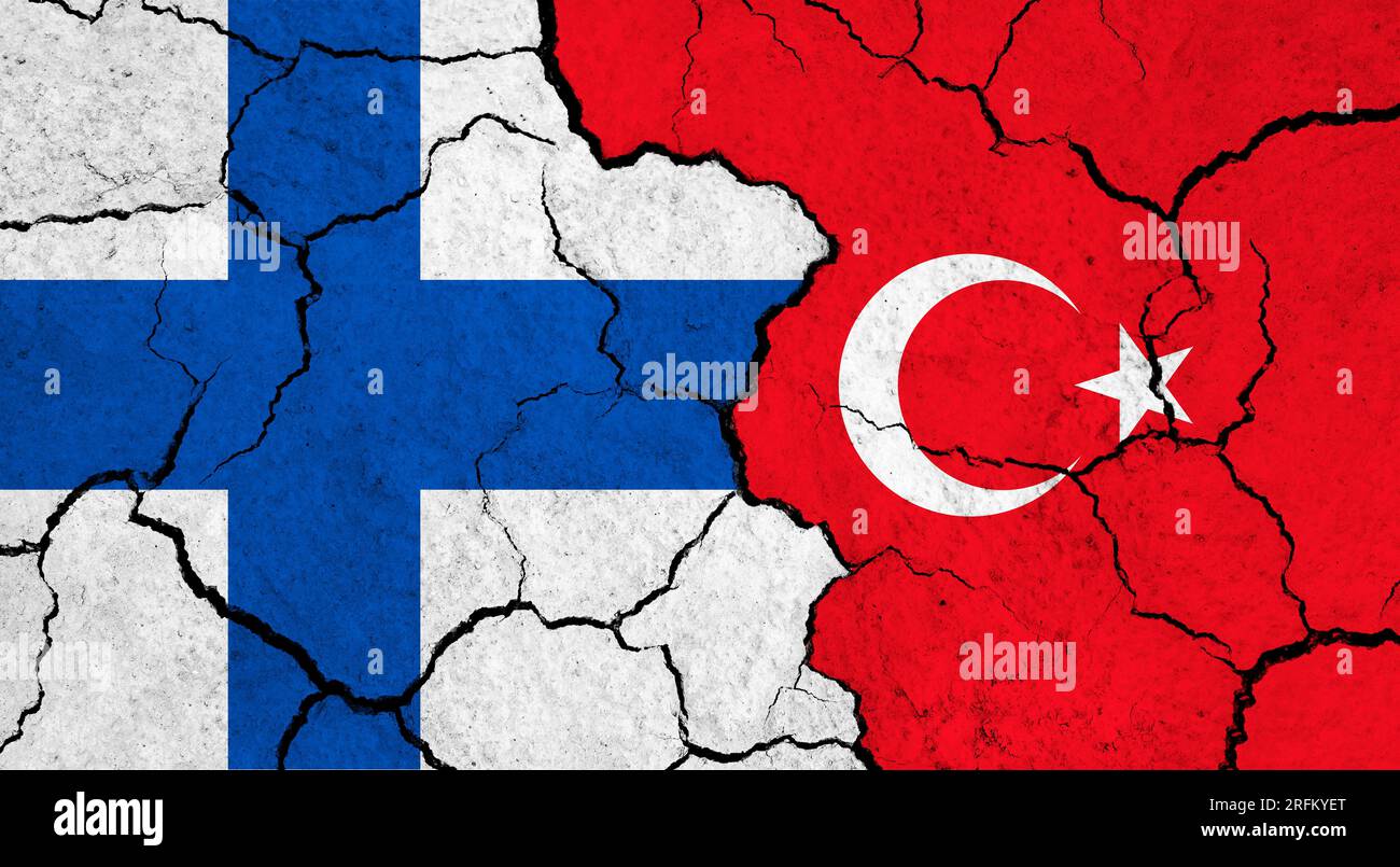 Flags of Finland and Turkey on cracked surface - politics, relationship ...