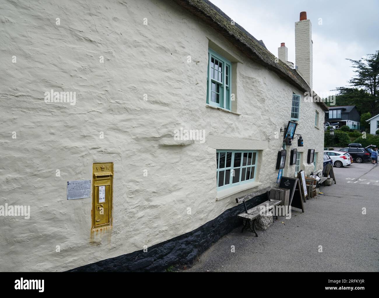 Ben Ainslie's gold Post Box at The Pandora Inn, Cornwall. Thursday ...