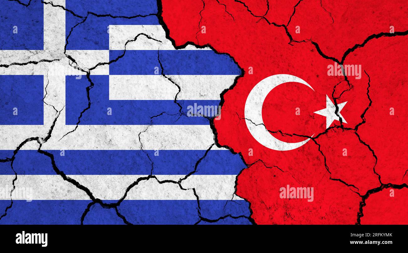 Flags of Greece and Turkey on cracked surface - politics, relationship ...