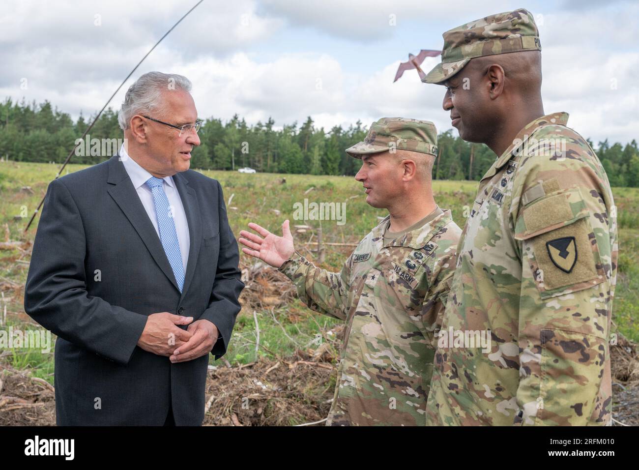 04 August 2023, Bavaria, Grafenwöhr: Joachim Herrmann (l, CSU ...