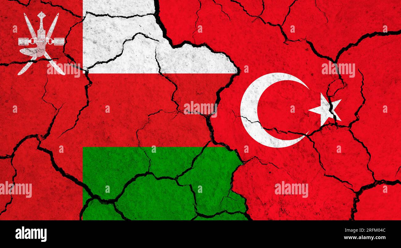 Flags of Oman and Turkey on cracked surface - politics, relationship ...