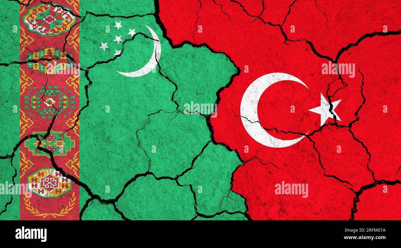 Flags of Turkmenistan and Turkey on cracked surface - politics ...