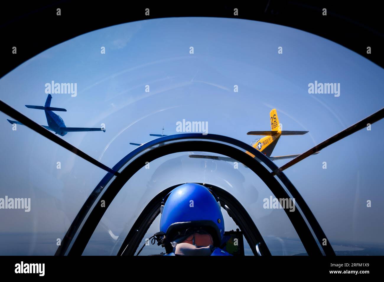A pilot eases his aircraft in to his position within the formation over ...