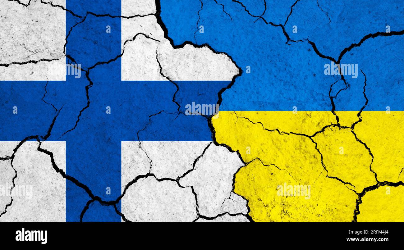 Flags of Finland and Ukraine on cracked surface - politics ...