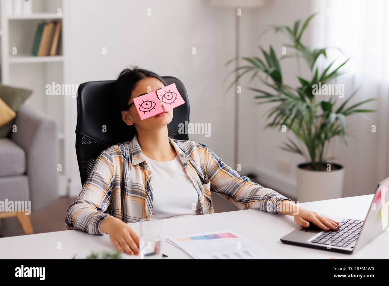 The concept of a lot of work. Tired Indian student girl sleeping with ... The concept of a lot of work. Tired Indian student girl sleeping with ...