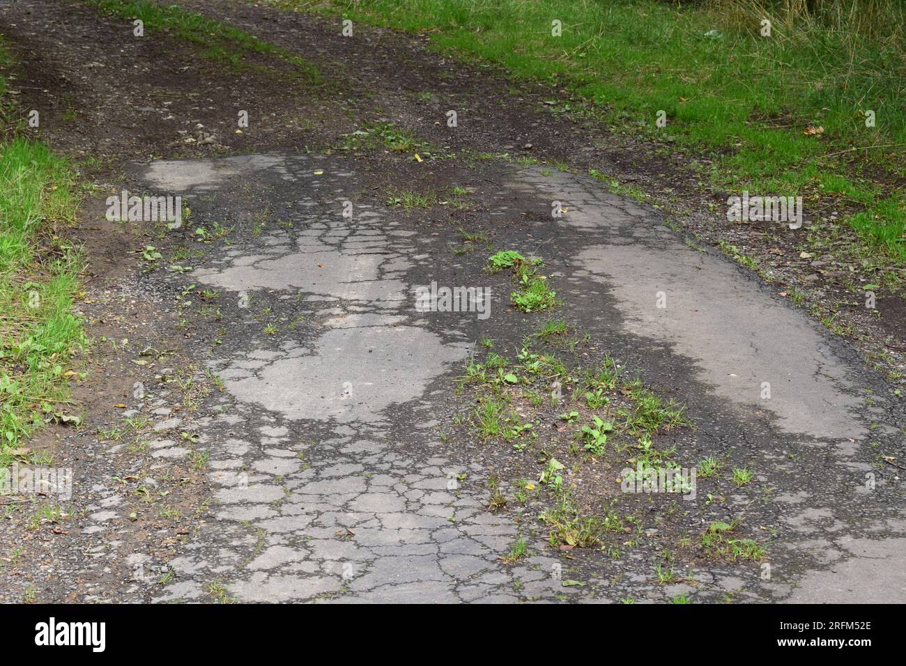 mud on a destroyed road Stock Photo - Alamy