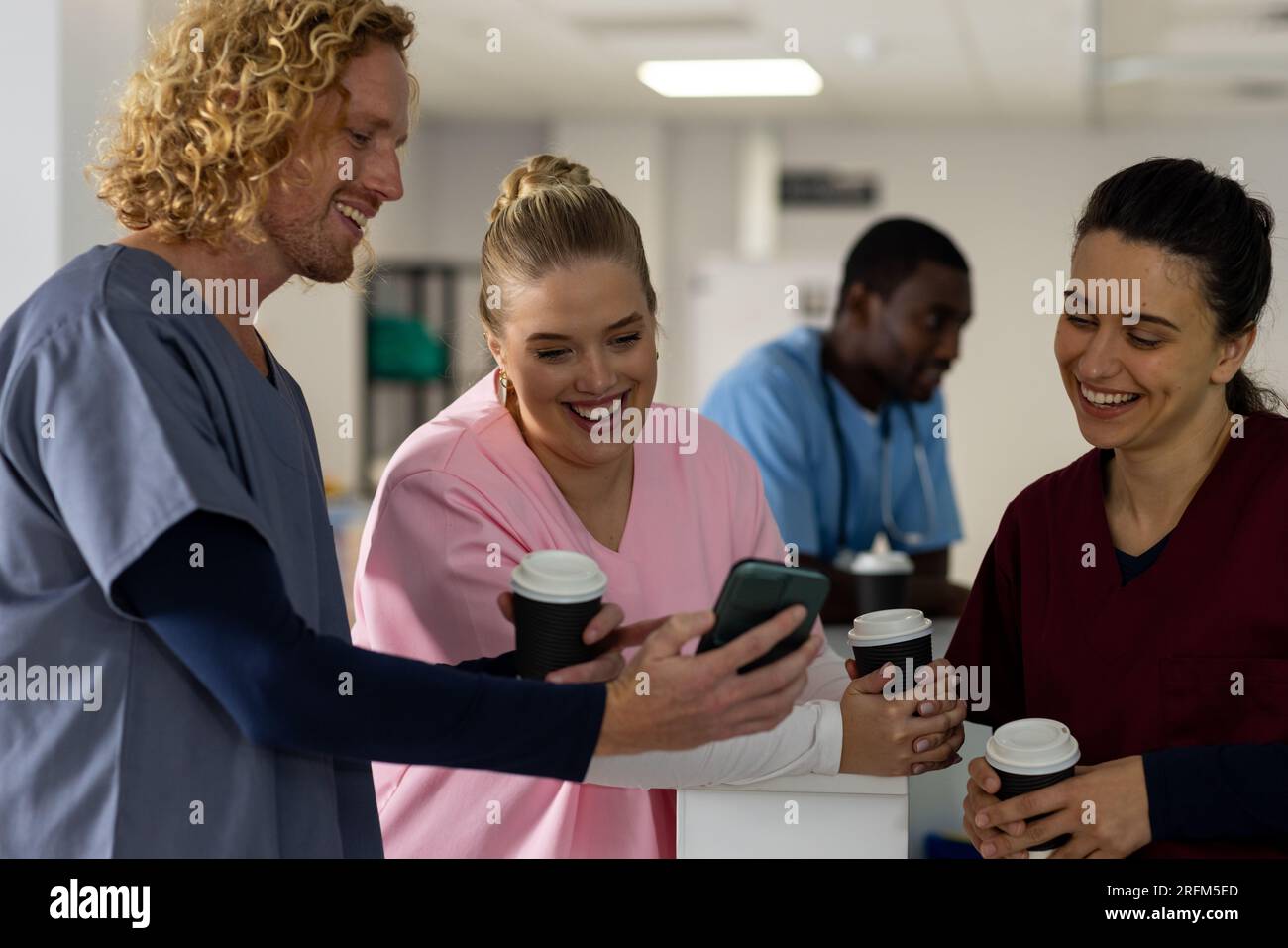 Young doctors drinking coffee hi-res stock photography and images - Alamy