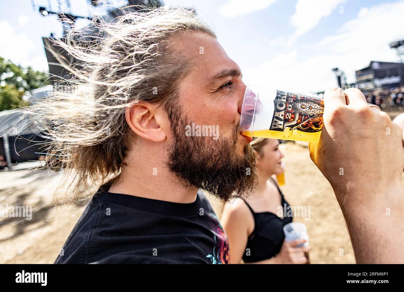 Wacken, Germany. 04th Aug, 2023. Visitors of the Wacken Open Air ...