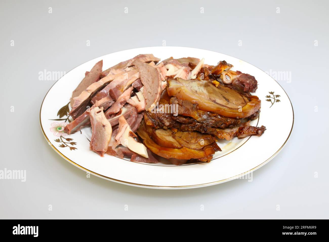 cooked food in a plate in a Chinese restaurant Stock Photo - Alamy