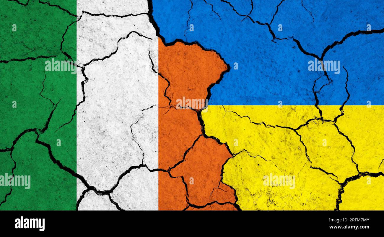 Flags of Ireland and Ukraine on cracked surface - politics ...