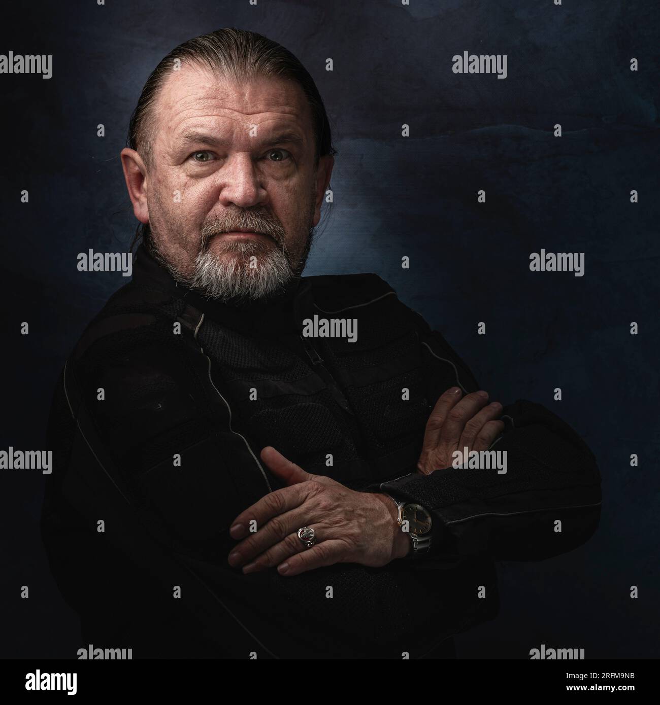 An adult man wear biker clothes Stock Photo - Alamy