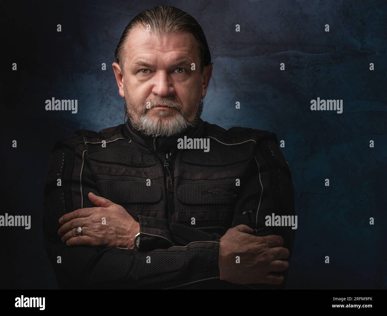 An adult man wear biker clothes Stock Photo - Alamy