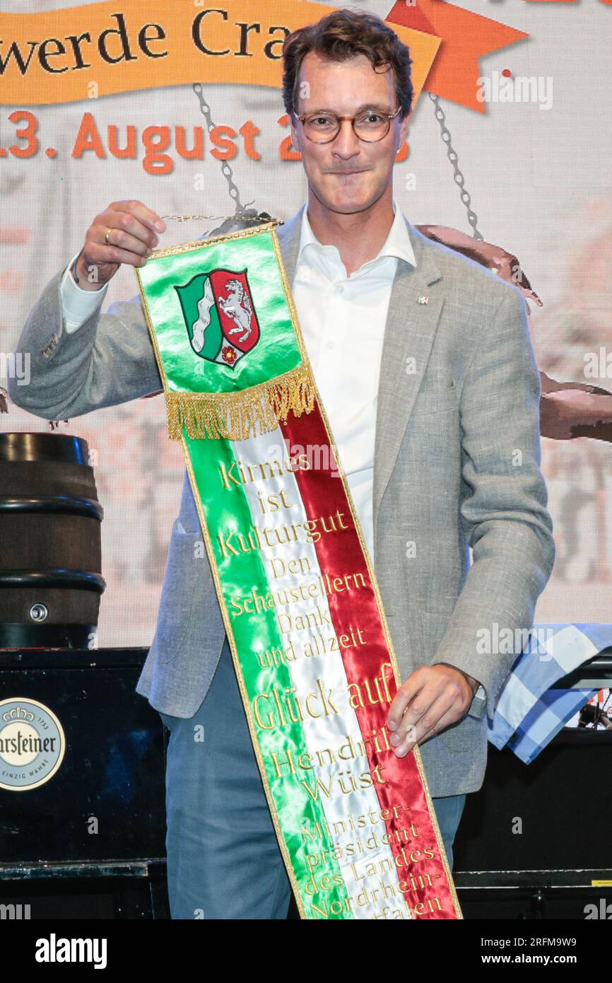 Herne, Germany. 04th August, 2023.Hendrik Wüst with the NRW flag. Prime ...