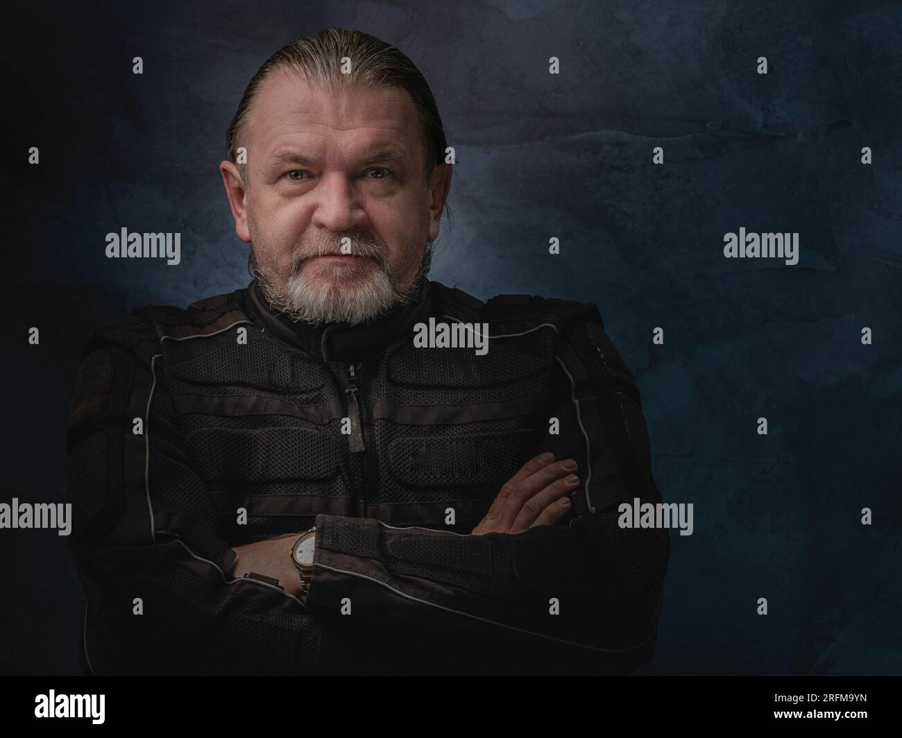 An adult man wear biker clothes Stock Photo - Alamy