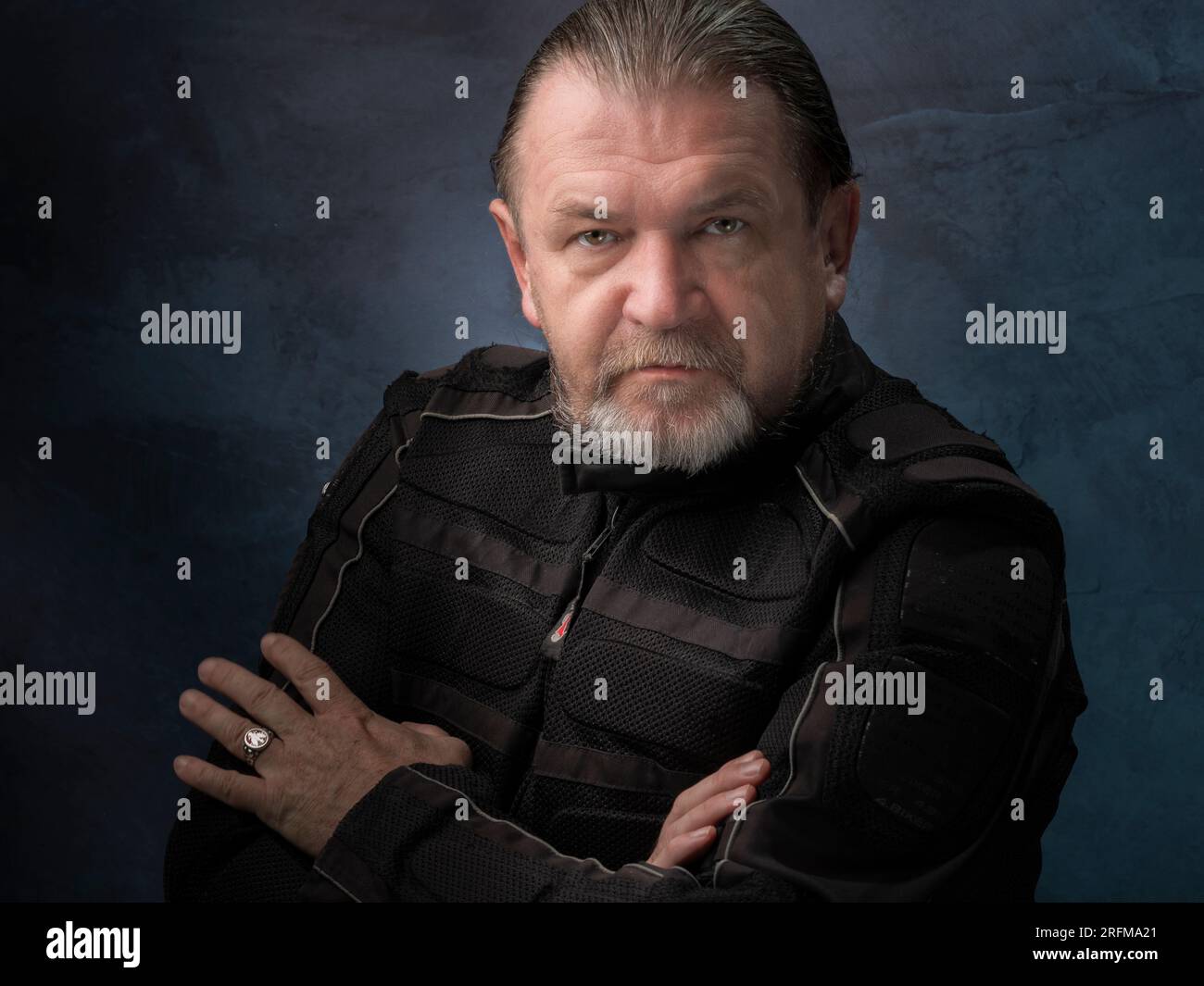 An adult man wear biker clothes Stock Photo - Alamy