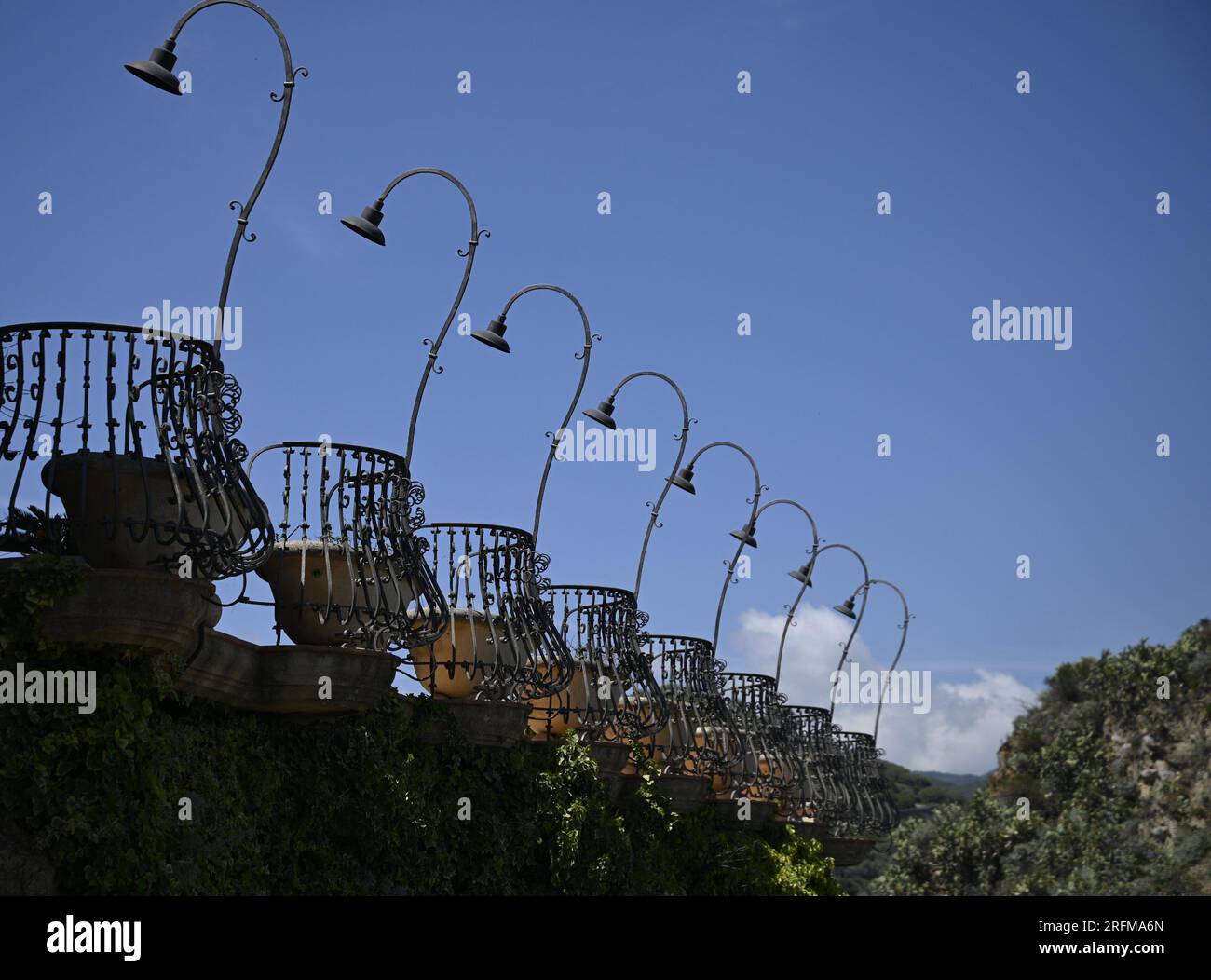 Traditional handcrafted wrought iron street light fixtures and balcony ...