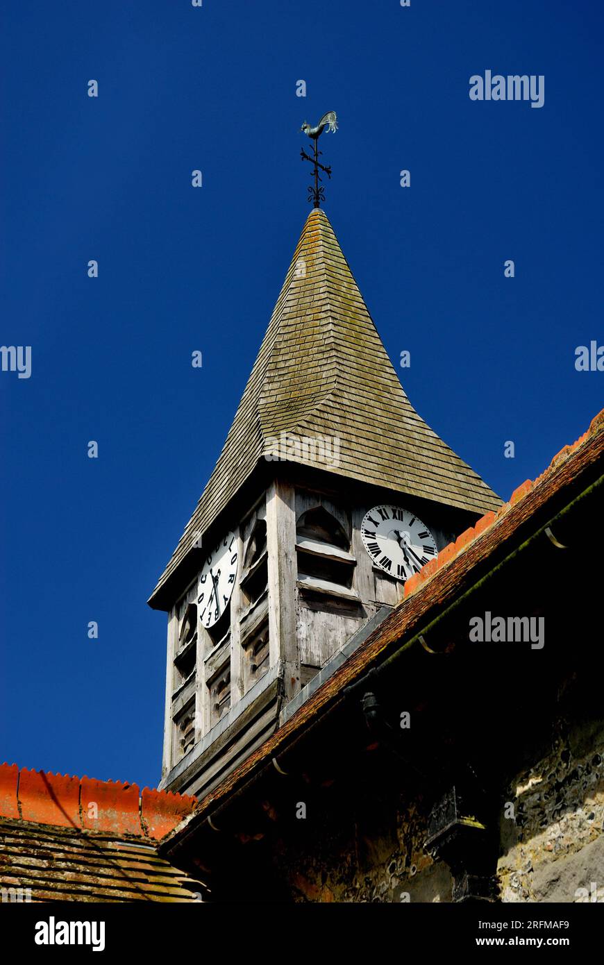 Unusual clock face on the spire of St Andrew's church, Wootton Rivers ...