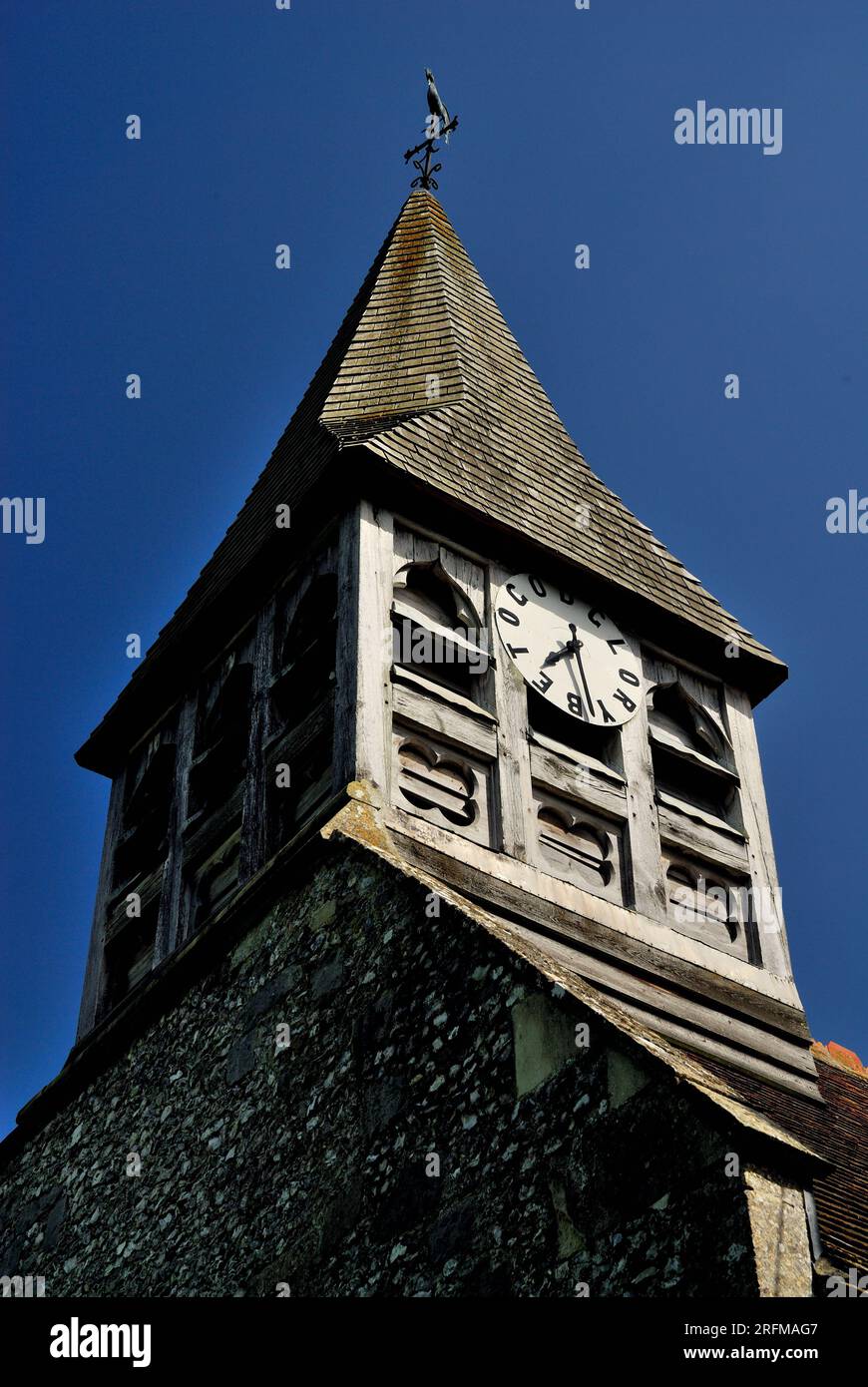 Unusual clock face on the spire of St Andrew's church, Wootton Rivers ...