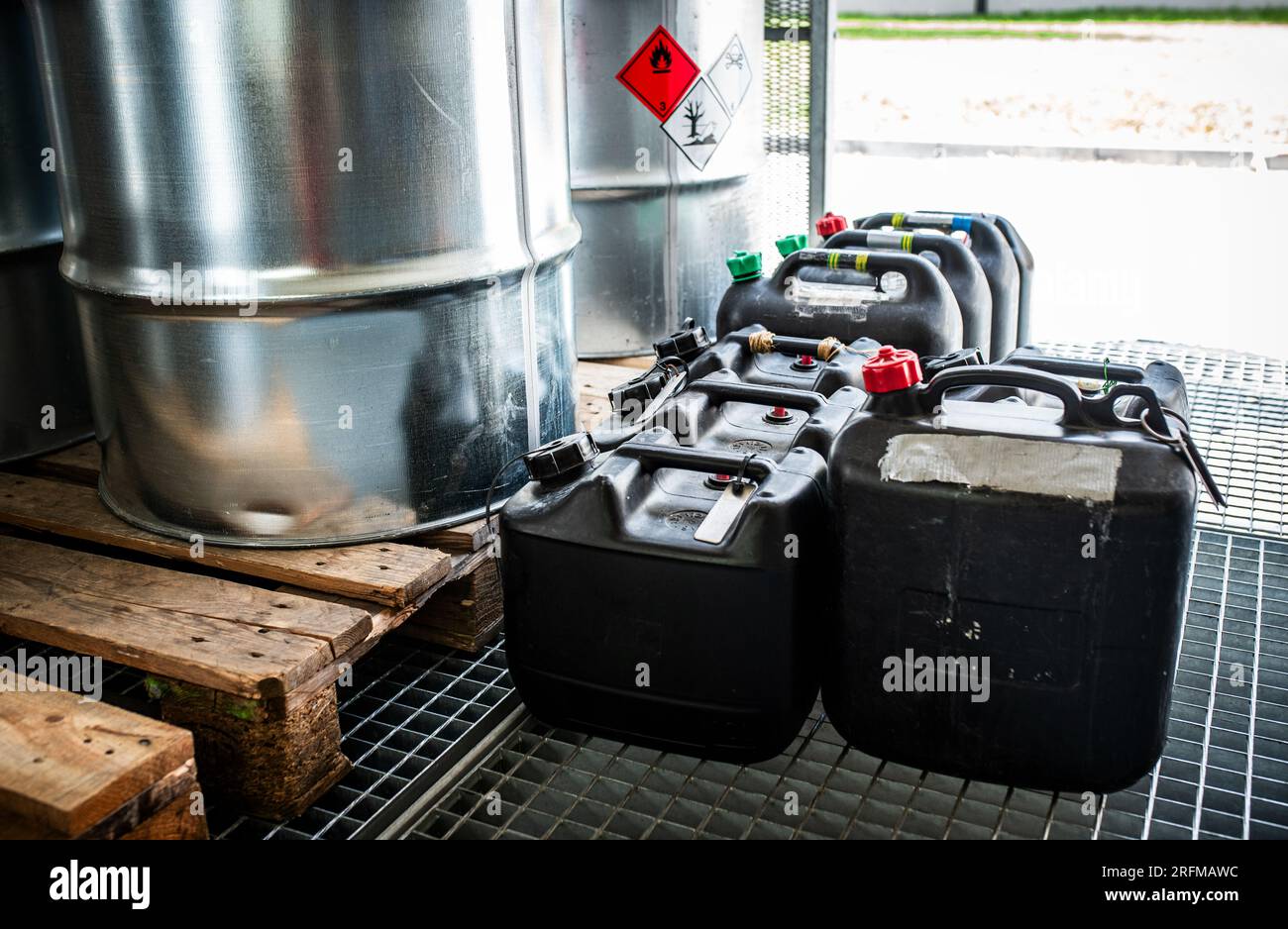 Plastic containers containing chemical waste from laboratories, waste ...