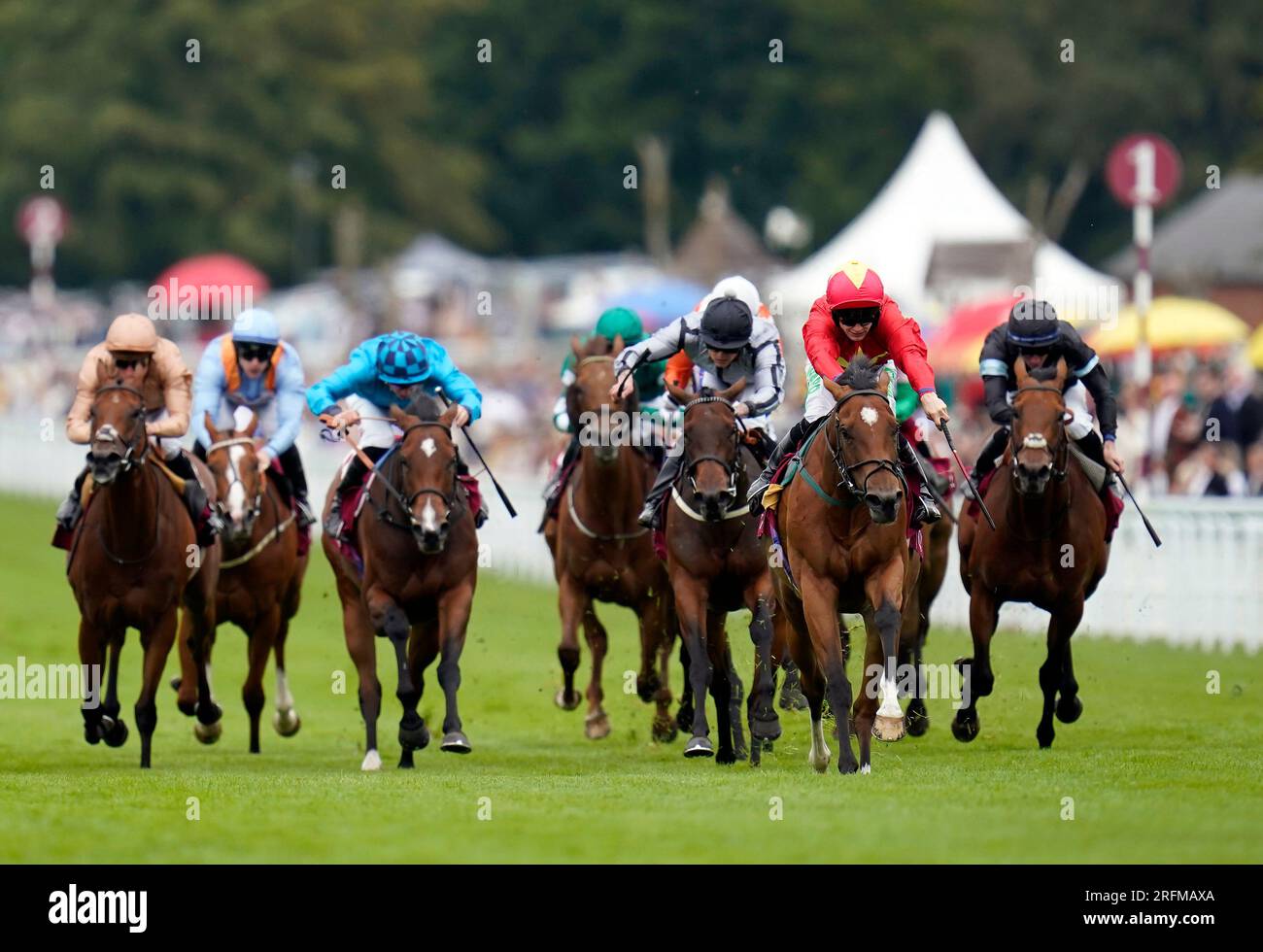 Highfield Princess ridden by jockey Jason Hart (red silks) on their way ...