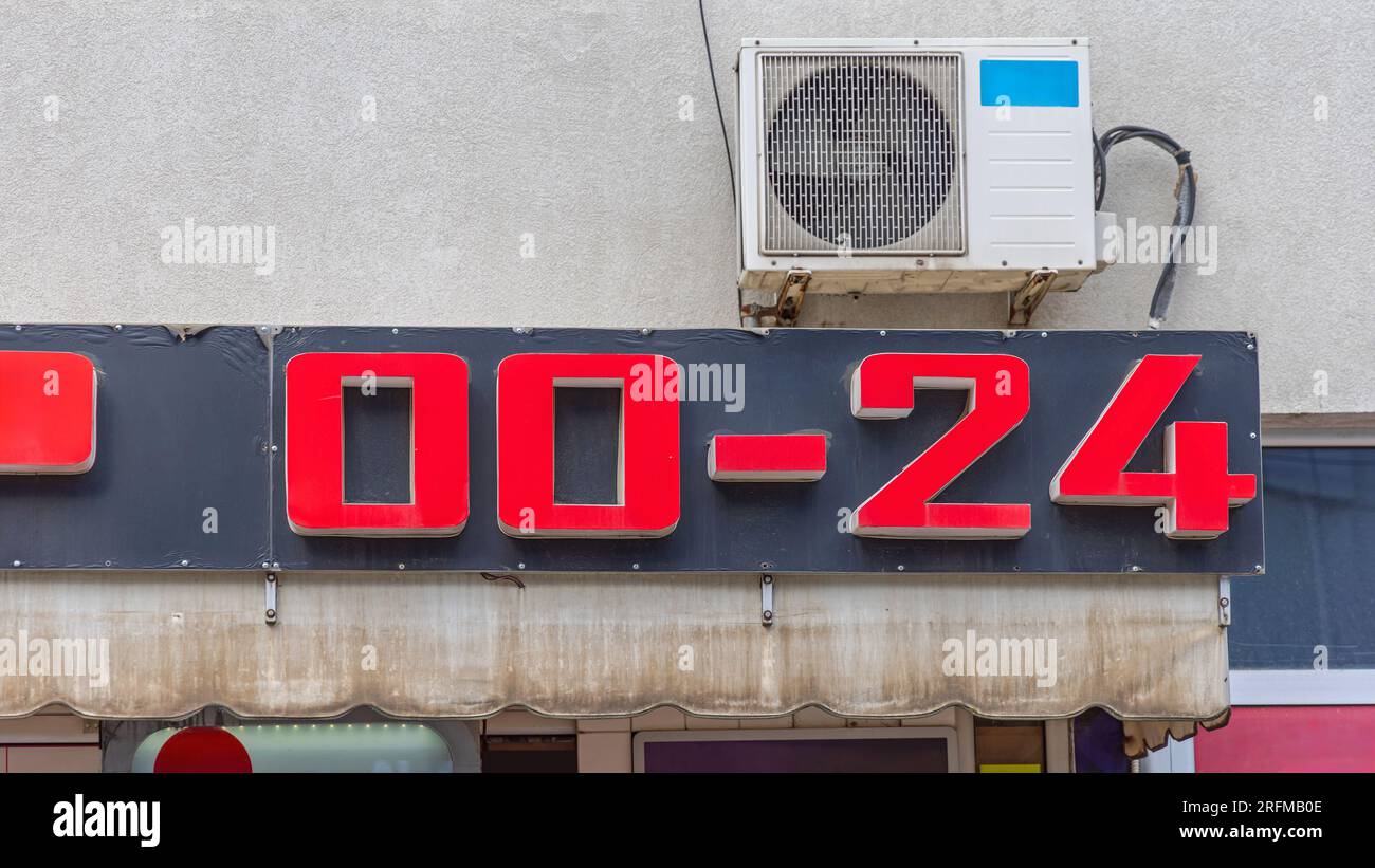 Red Sign Non Stop Opening Hours at Shop Double Zero to Twenty Four ...