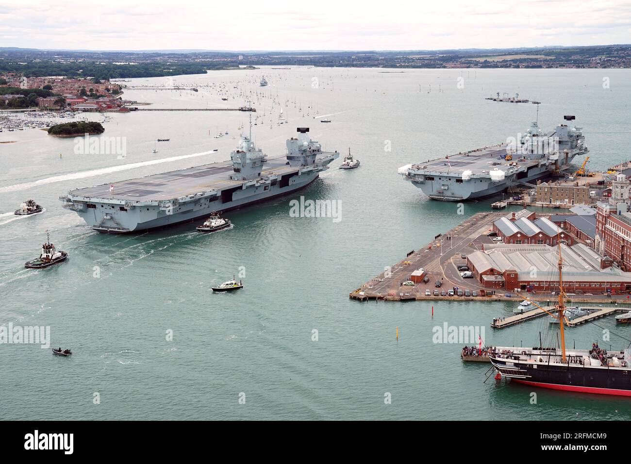 Aircraft carrier HMS Prince of Wales arrives at Portsmouth Naval Base ...