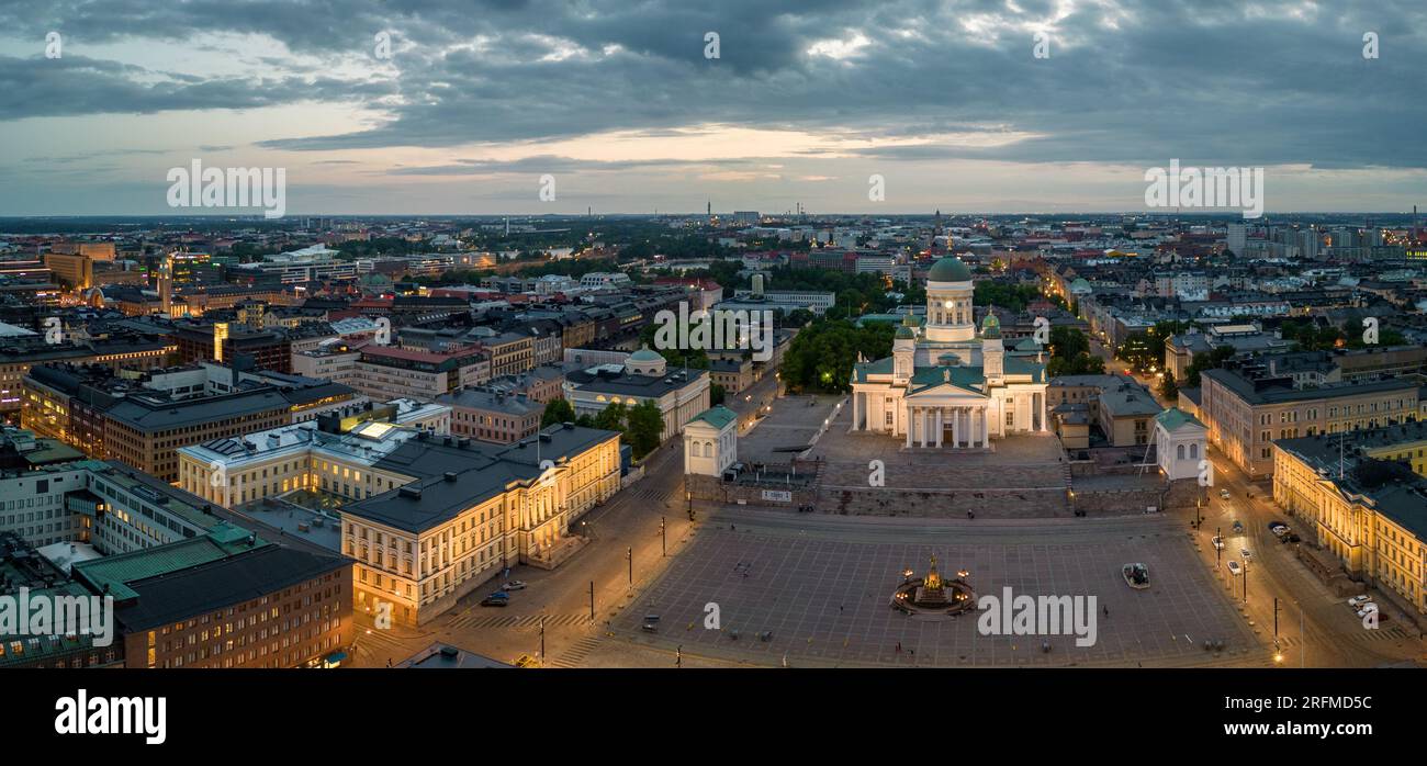 Brightly lit cathedral in European city square at dawn Stock Photo - Alamy