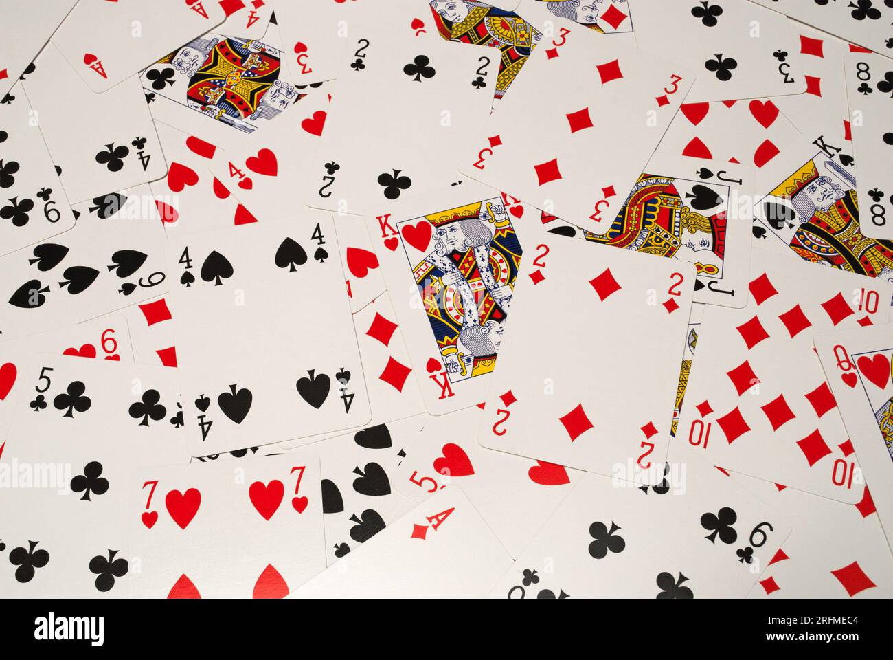 Scattered playing cards hi-res stock photography and images - Alamy