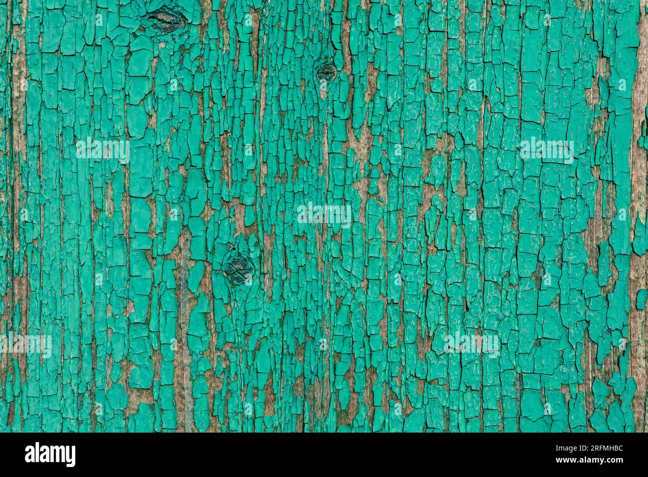Wood texture with green flaked paint. Peeling paint on weathered wood ...