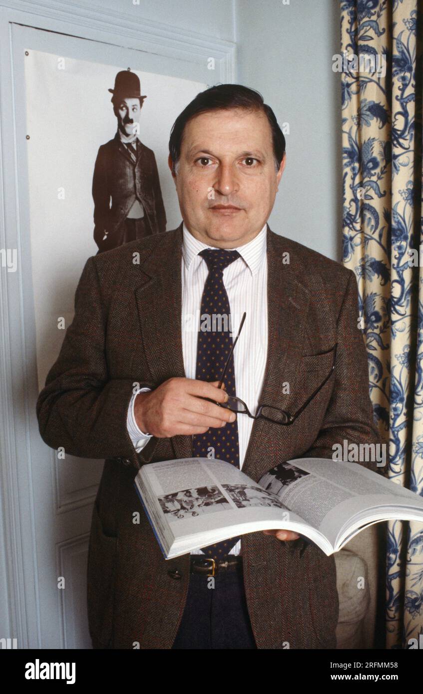 French film journalist Claude-Jean Philippe at home in Paris, c.1985 ...
