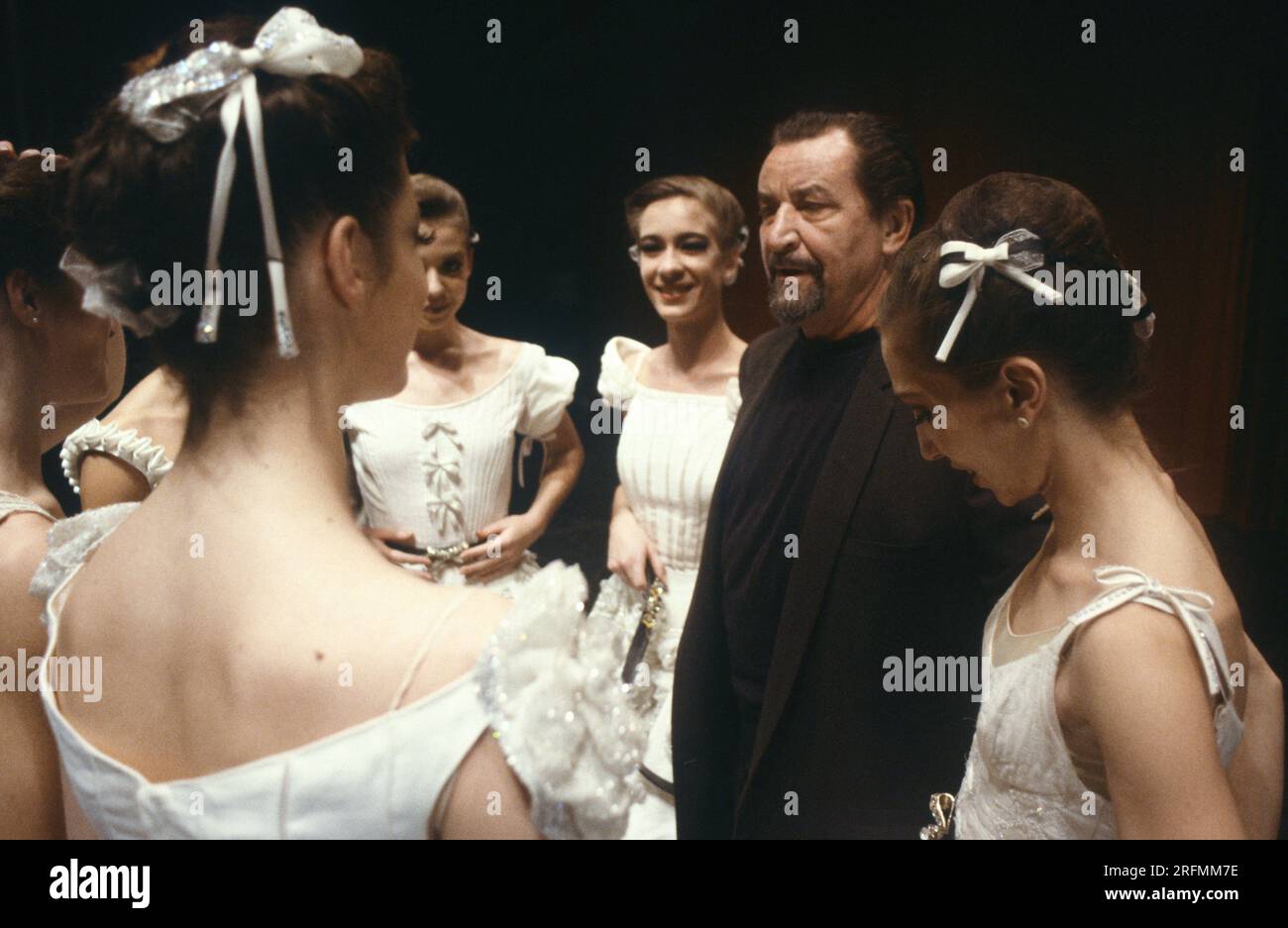 The French choreographer Maurice Béjart with young classical dancers ...