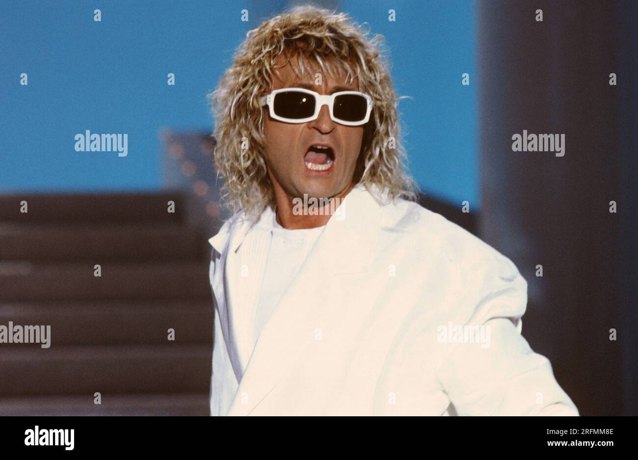 French singer Michel Polnareff on the set of a television show in 1986 ...