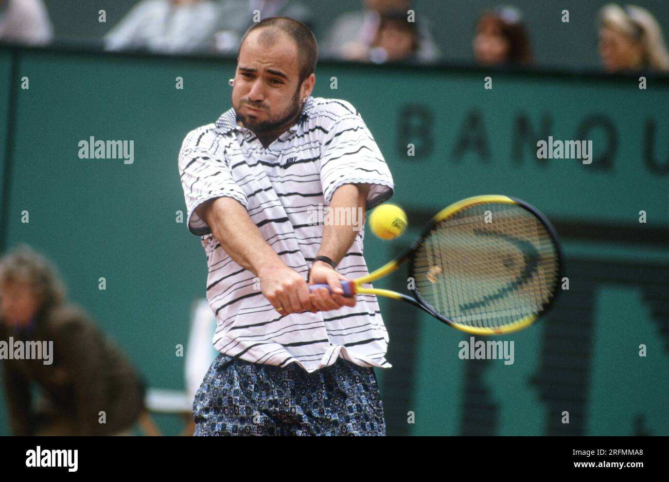 American tennis player Andre Agassi playing the men's singles 1/4 final ...