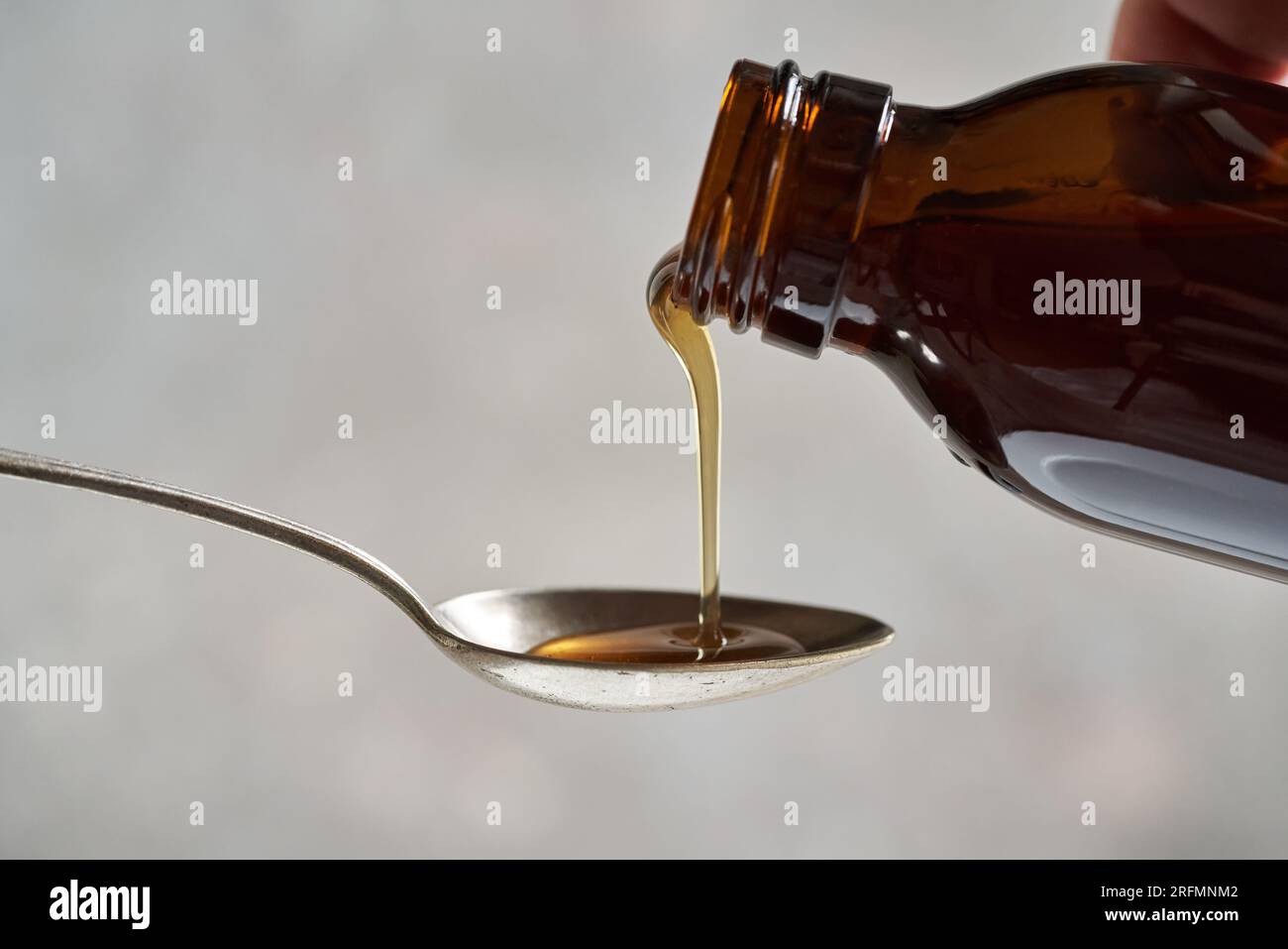 Hand pouring syrup from hi-res stock photography and images - Alamy