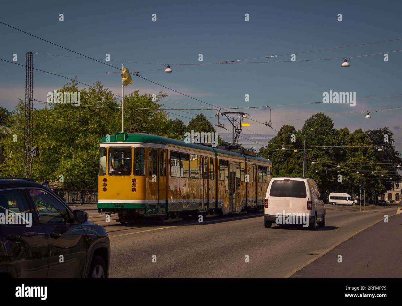a tram on a bridge against the sky Stock Photo - Alamy