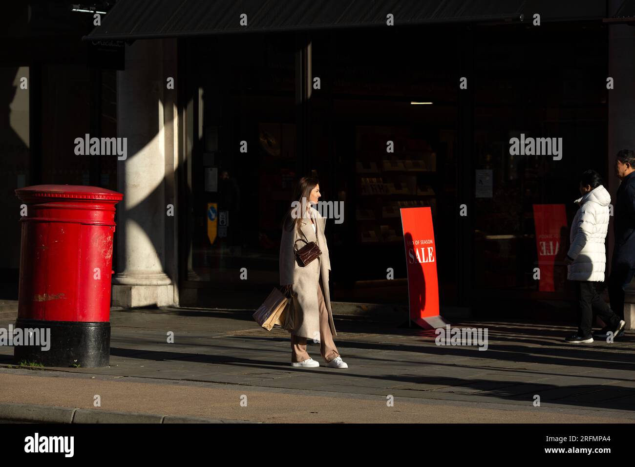 Shoppers walk in central London, on Boxing Day Stock Photo - Alamy