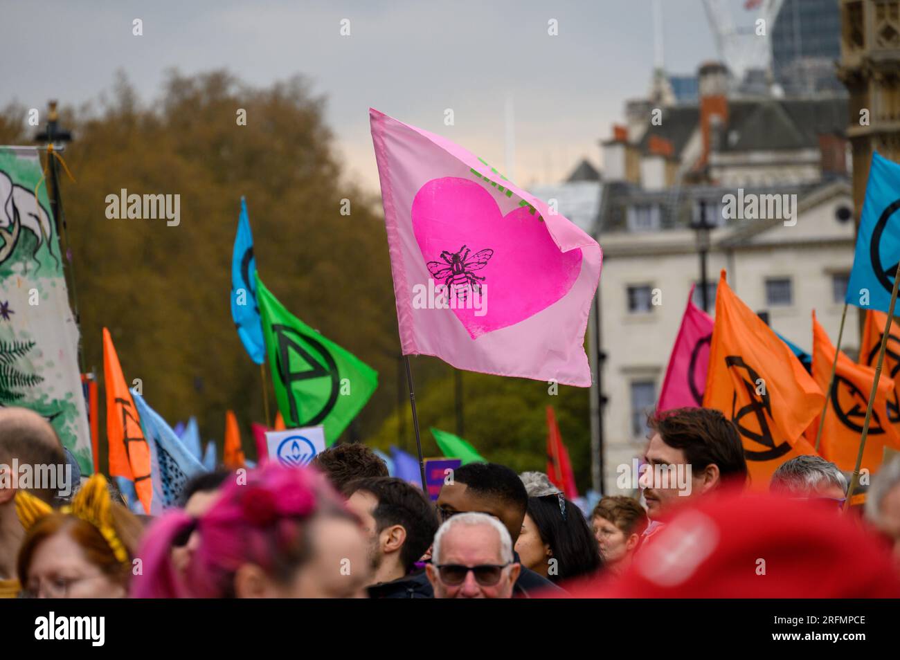 LONDON - April 22, 2023: Witness environmental protest flags soaring ...