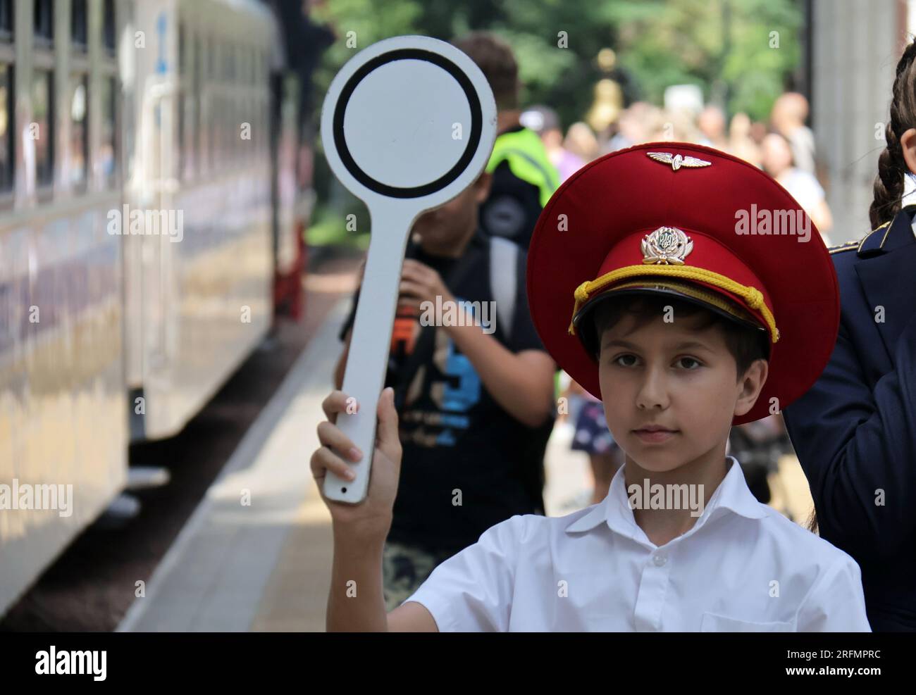 KYIV, UKRAINE - AUGUST 2, 2023 - A student signals during the ...