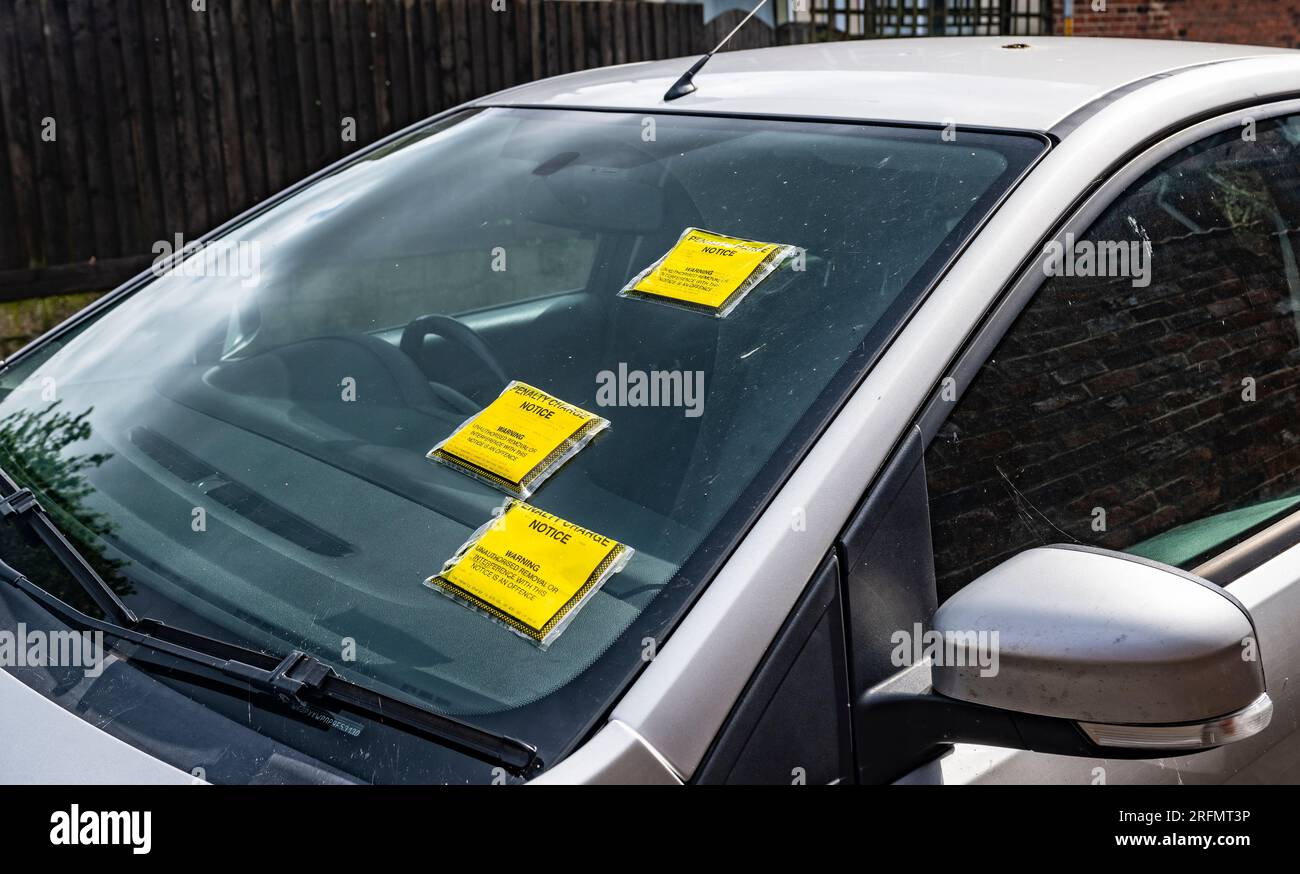 Parking tickets on car windshields hi-res stock photography and images ...