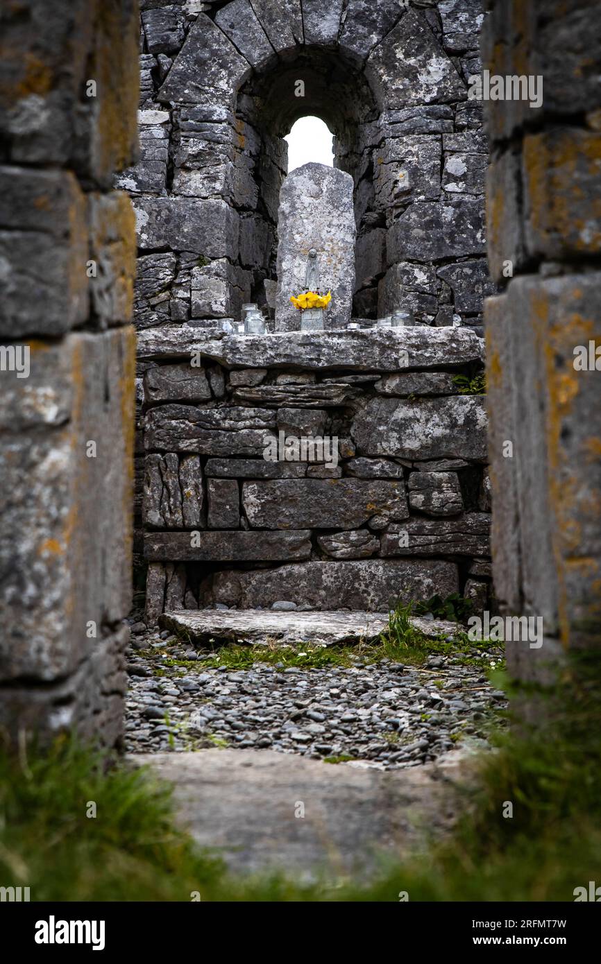 Worship statue inside old Church ruins at Inisheer Aran Island Ireland ...