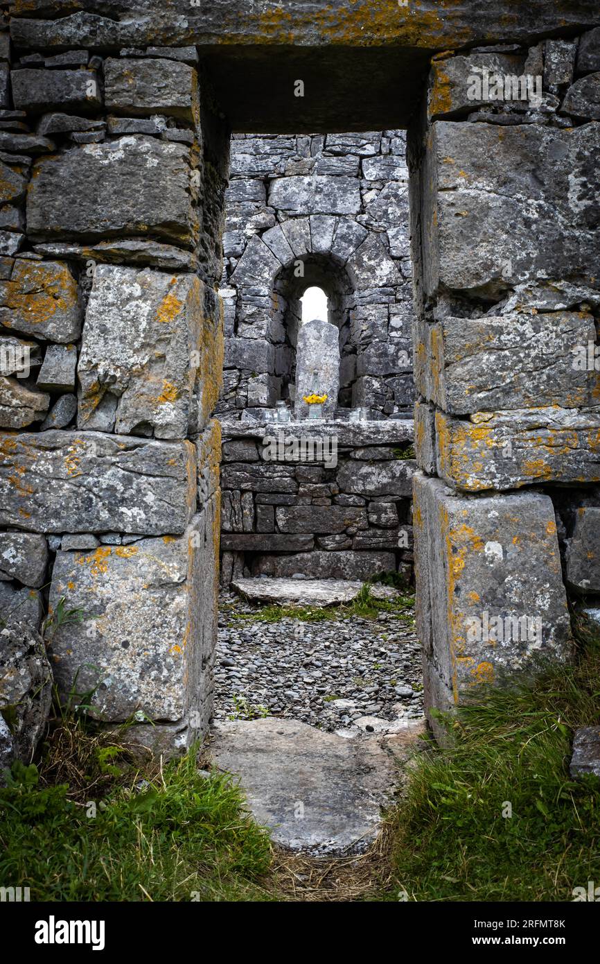 Worship statue inside old Church ruins at Inisheer Aran Island Ireland ...