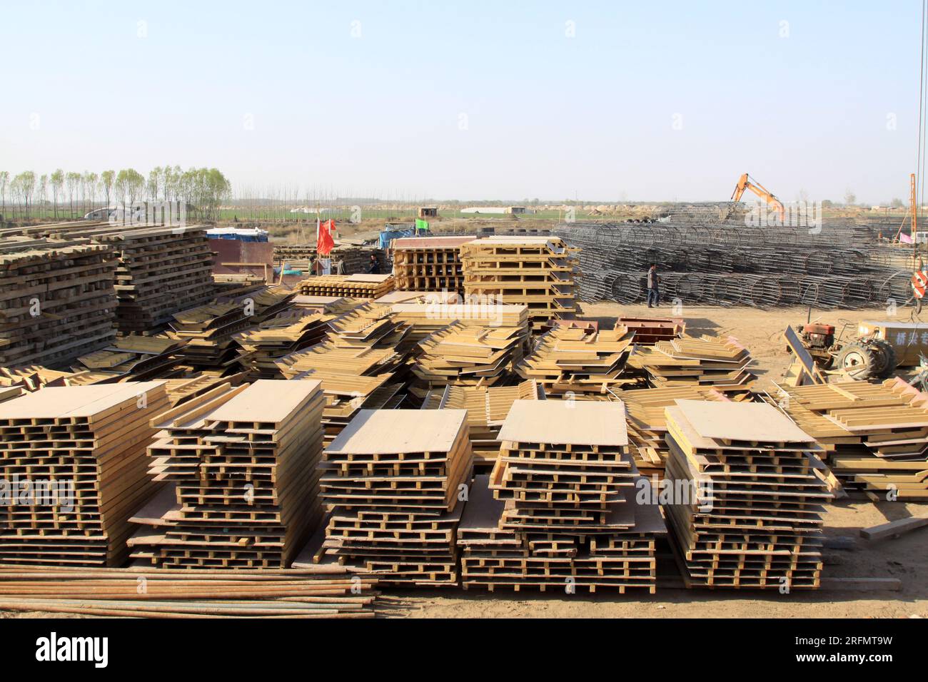 materials piled up at a construction site, north china Stock Photo - Alamy
