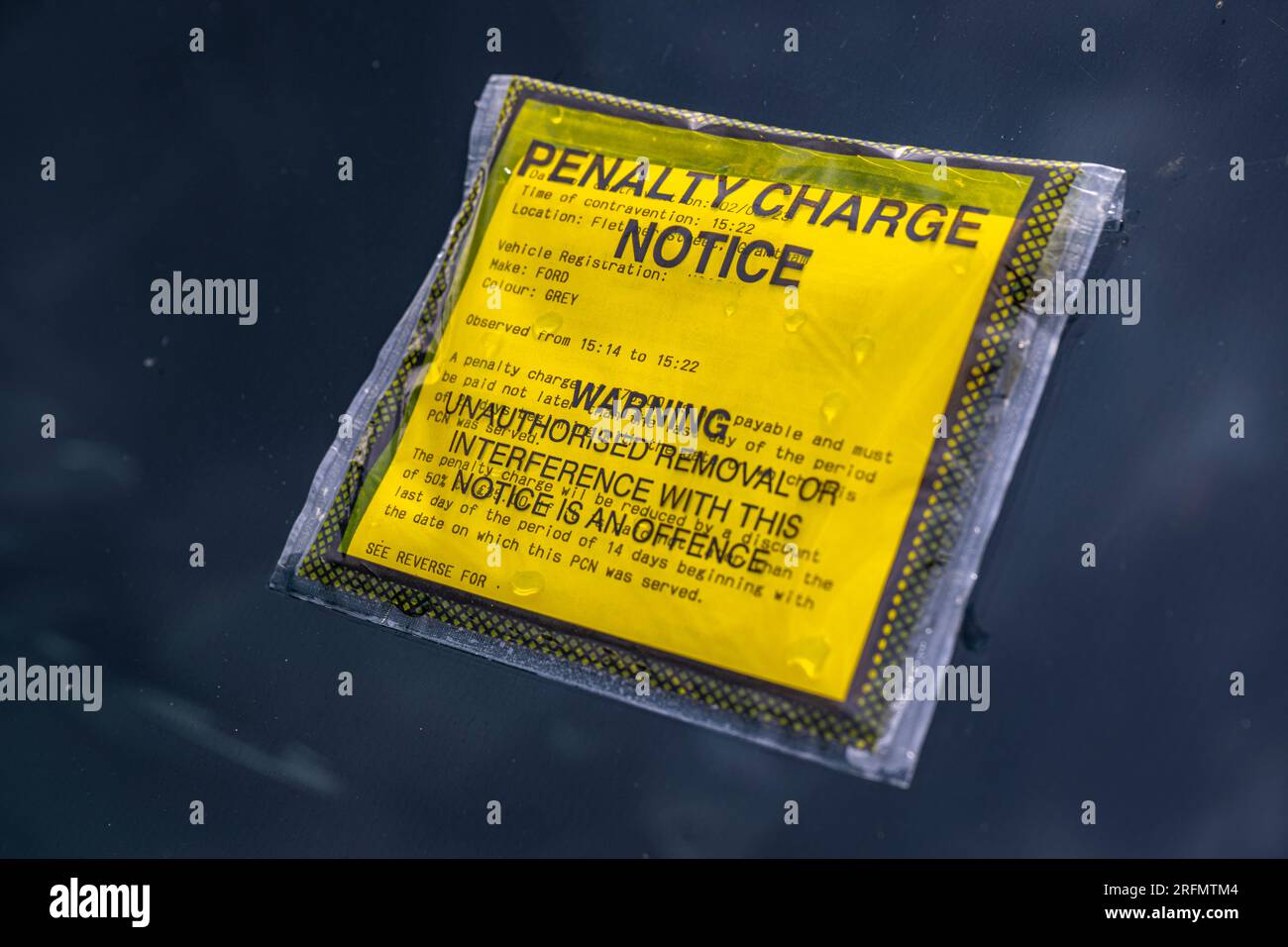 Parking Ticket or Penalty Charge Notice on the windscreen of a car ...