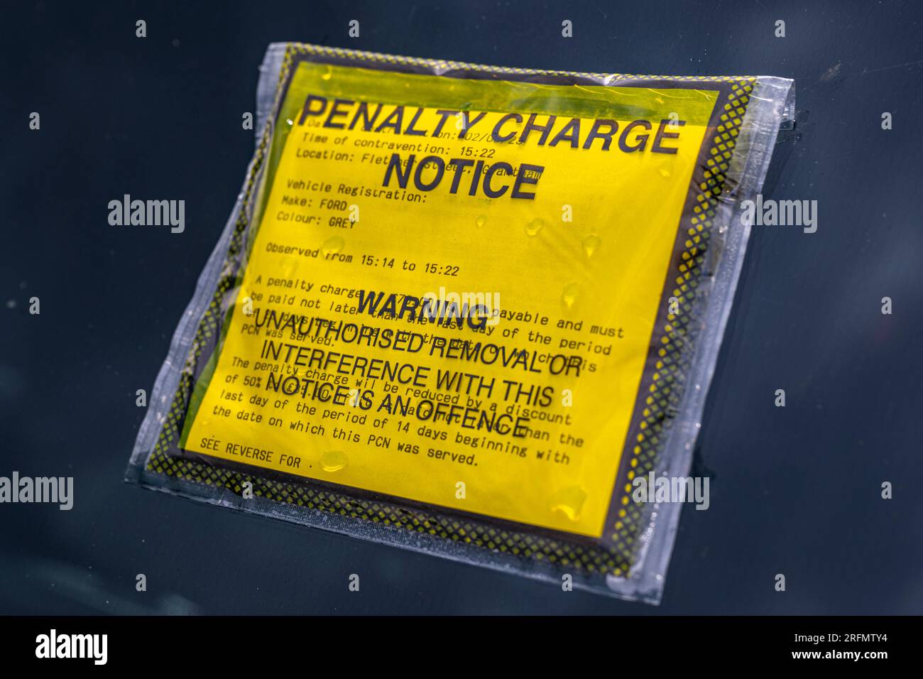 Parking Ticket or Penalty Charge Notice on the windscreen of a car ...