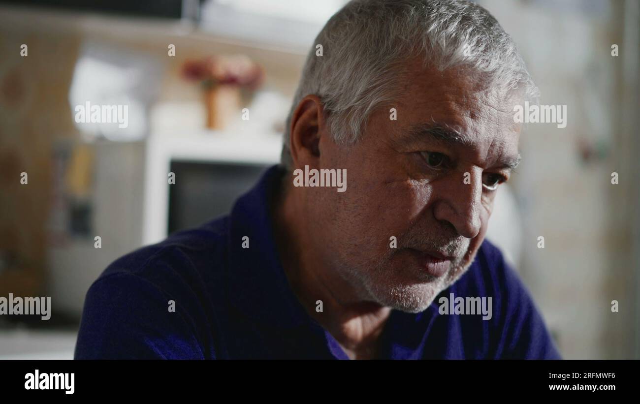 Hopeless Senior Man in Quiet Despair at Home, Close-Up Depiction of ...