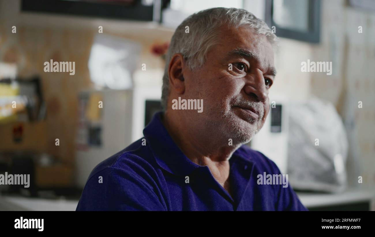 Hopeless Senior Man in Quiet Despair at Home, Close-Up Depiction of ...