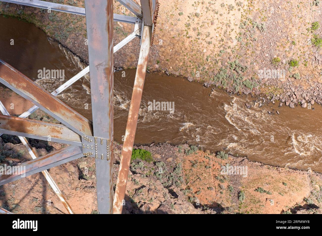 Details of bolted gusset plate on Rio Grande Gorge Bridge over flowing ...