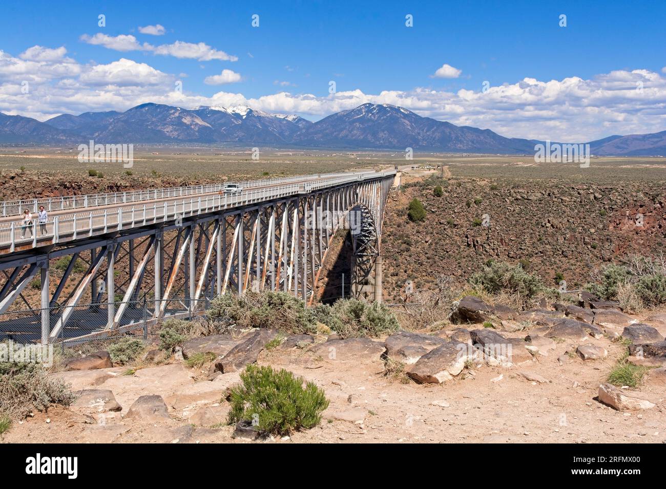 Pedestrians and vehicle crossing on Rio Grande Gorge Bridge 650 feet ...