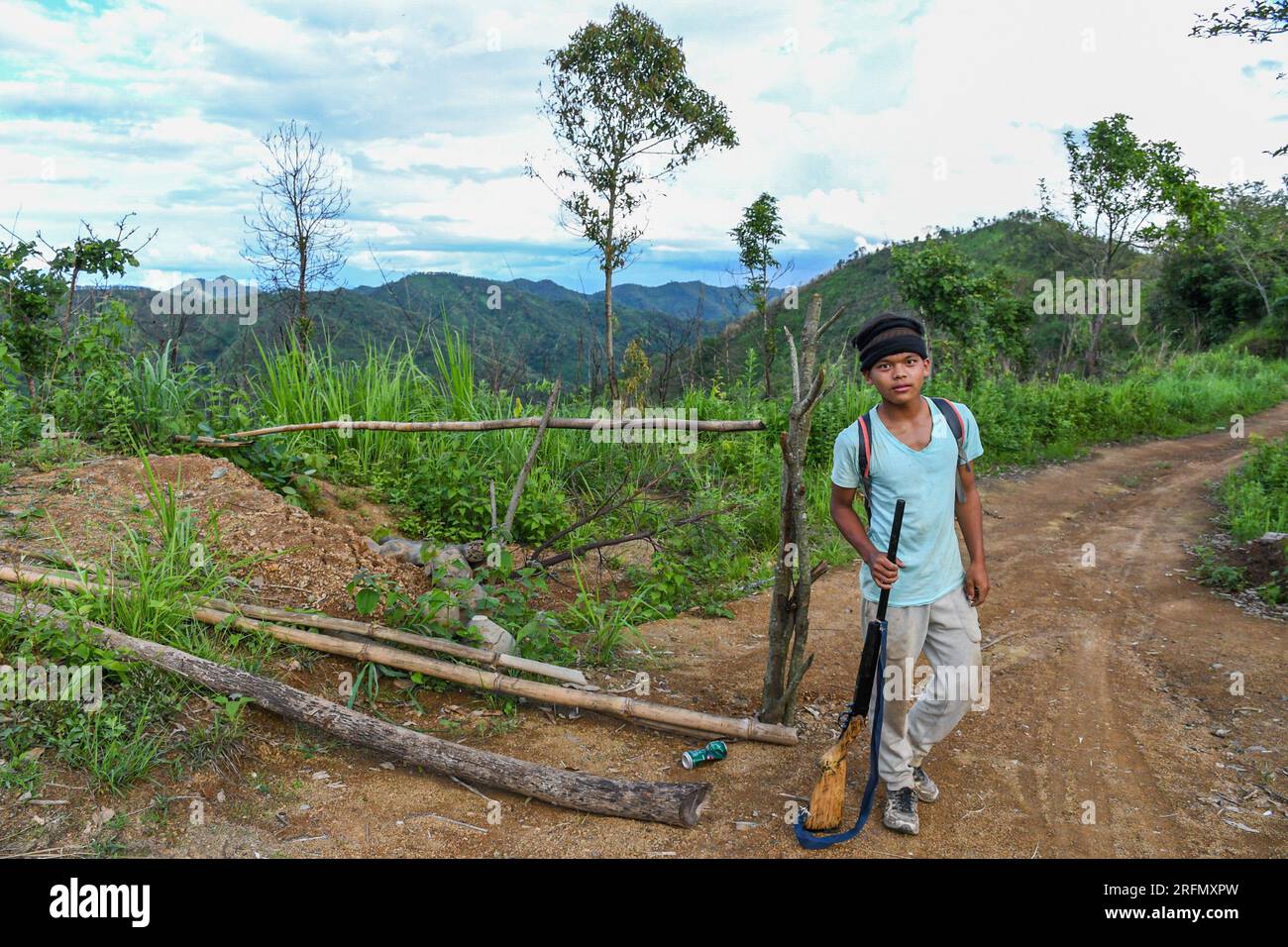 June 22, 2023, Churachandpur, Manipur, India: Henry, 14, an armed Kuki ...